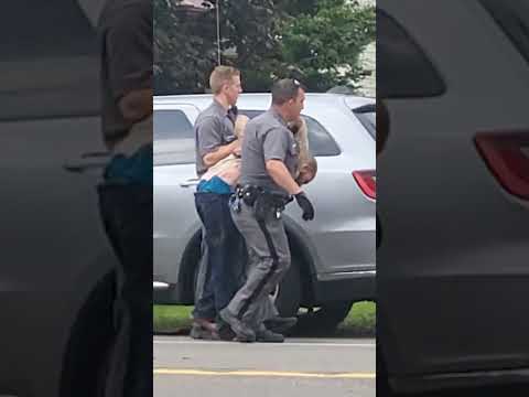 Person being taken into custody by police after chase that crossed multiple counties.