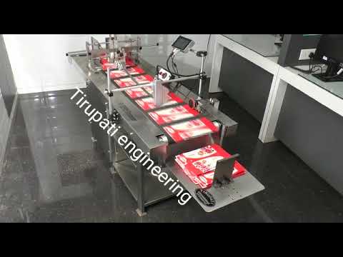 CARTON FEEDING MACHINE - Carton Feeder Conveyor Manufacturer from Ahmedabad