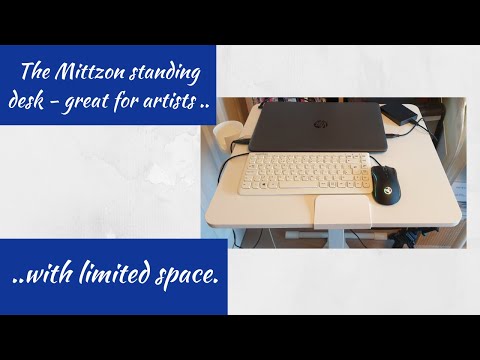 The standing desk Mittzon from Ikea is great for artists with very small space.