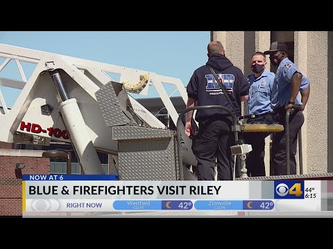 Blue and firefighters visit Riley Hospital