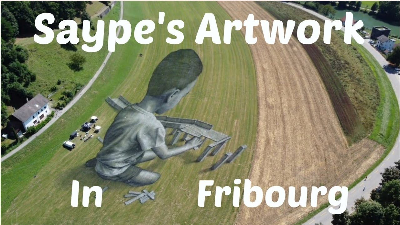 Saype’s artwork in Fribourg, Switzerland/ 10 ans le pont de la poya