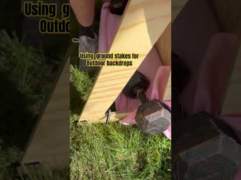 A great solution for outdoor backdrops for your next event are ground stakes. Perfect DIY solution.