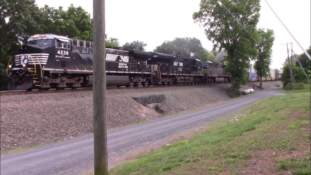 Chasing NS 214 up the B-Line with a shiny AC44C6M engine and a rock train with Dash 9 white face