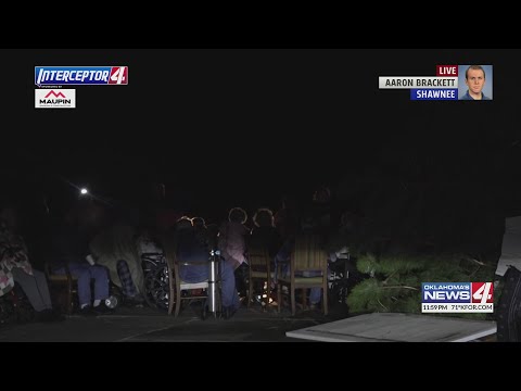 People waiting outside after tornado touches down in Shawnee