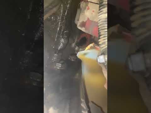 Oil leaking from the blow-by tube on a Cummins engine typically indicates excessive pressure.