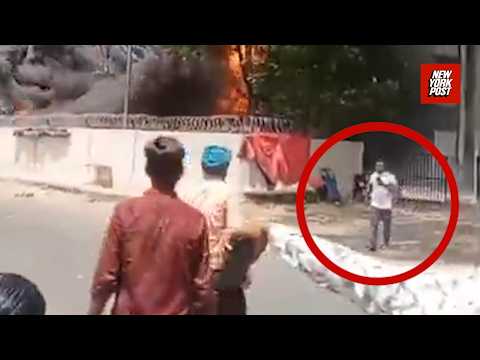 UNBELIEVABLE moment Air India survivor walks away from fiery crash