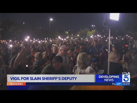 Vigil held for sheriff's deputy fatally shot in ambush-style killing