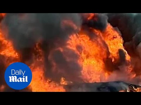 Russian soldier hits mine with stick and nearly gets his head blown off