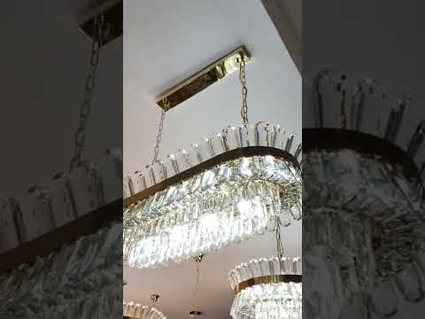 Glamour & refined style are embodied in this gold crystal chandelier.
