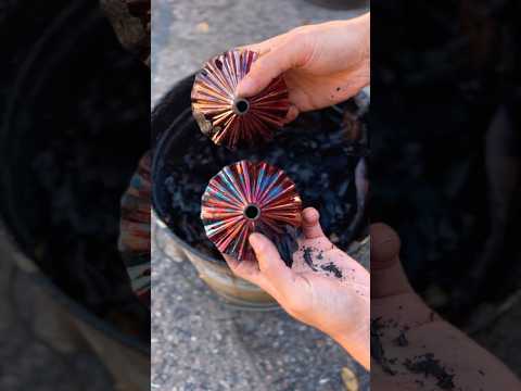 Making metallic Christmas ornaments out of porcelain in a raku kiln. #ceramic #christmas #pottery