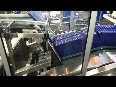 SST Security seal labeller applying 100 DVDs per minute