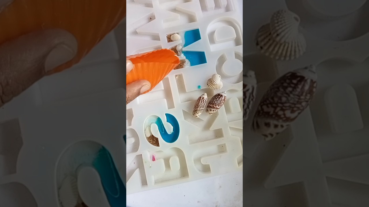 Epoxy Resin Ocean⛴️🌊 using shells white & blue pigment || Ocean Art #shorts #resinkeychain #ocean