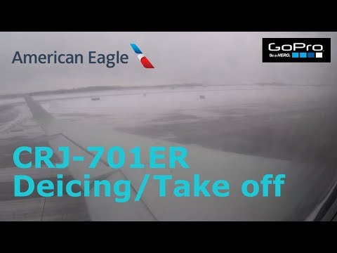 American CRJ-701ER [N744SK] De-icing and Take off from DTW RW 21R