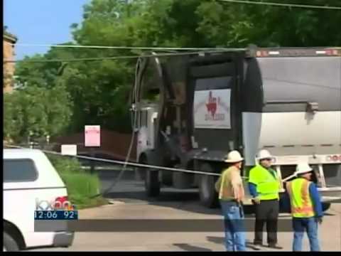 Truck hits power lines on Bluff Springs