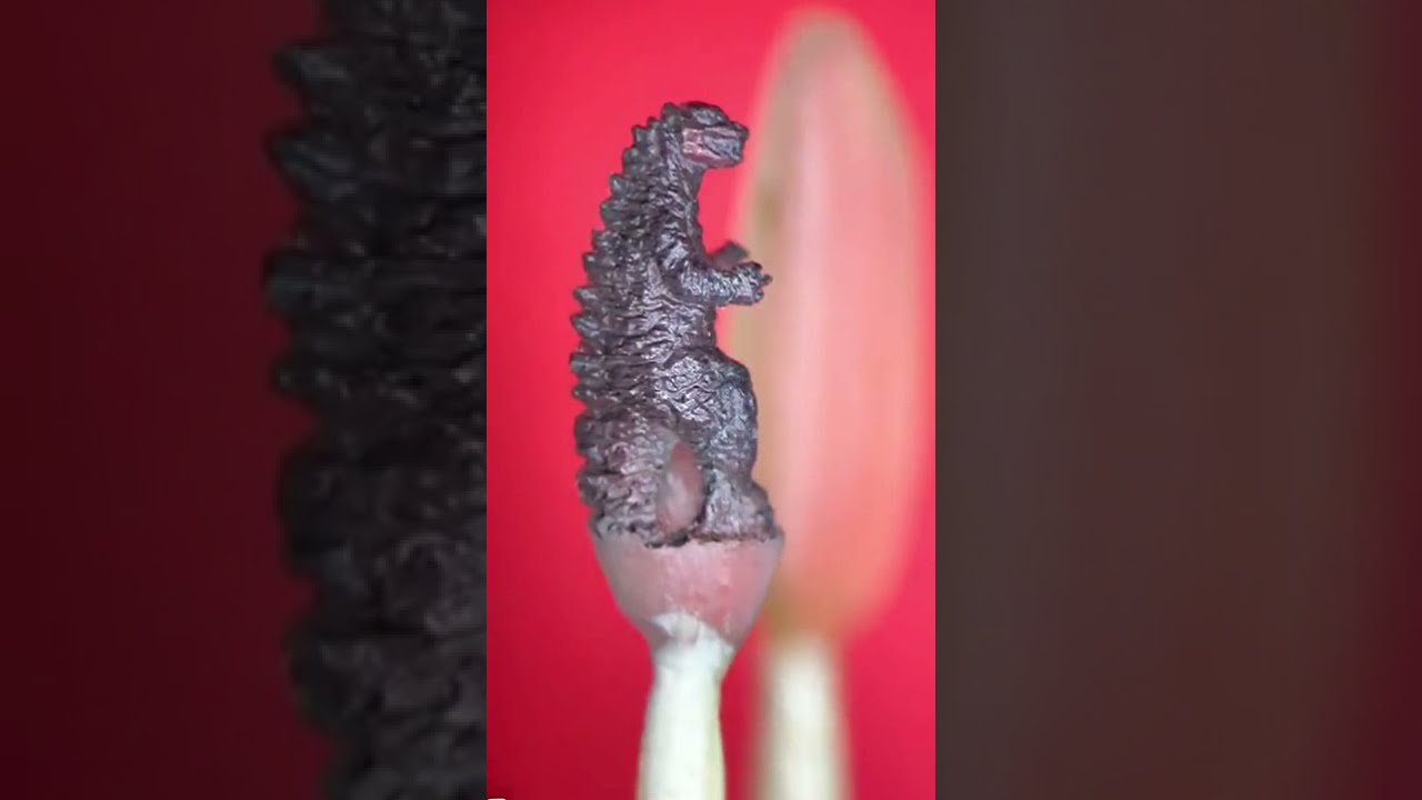 Godzilla carved from a grain of rice - Reddit r/nextfuckinglevel