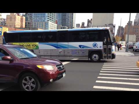 Academy Bus : MCI D4000 #8607 (Javits Center Shuttle) at 11th Avenue & 36th Street