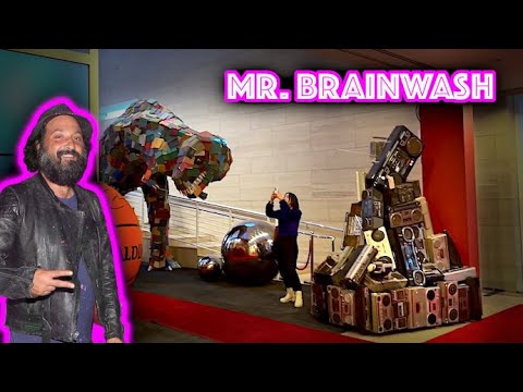 Street Artist Mr. Brainwash Poses With Fans At The Opening Of His Art Museum