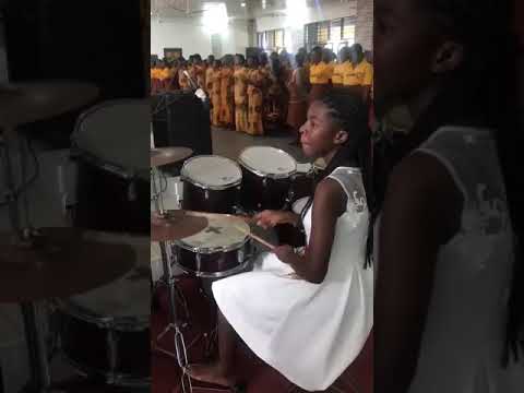 A gifted girl on the drum