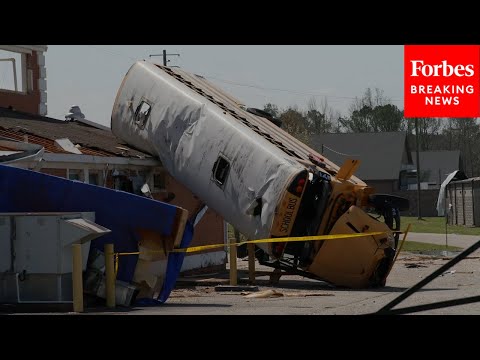Video | WATCH: Possible Tornado Throws School Bus Into Side Of High ...