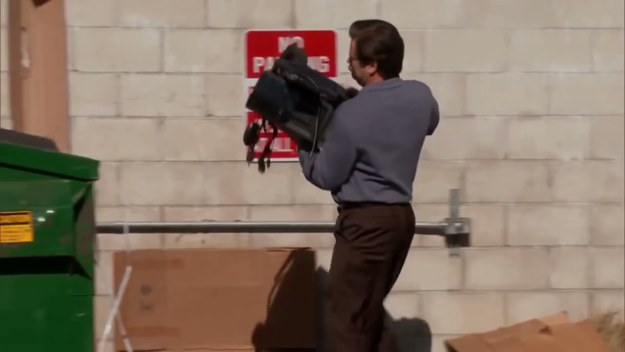 Ron Swanson throws pc into garbage meme