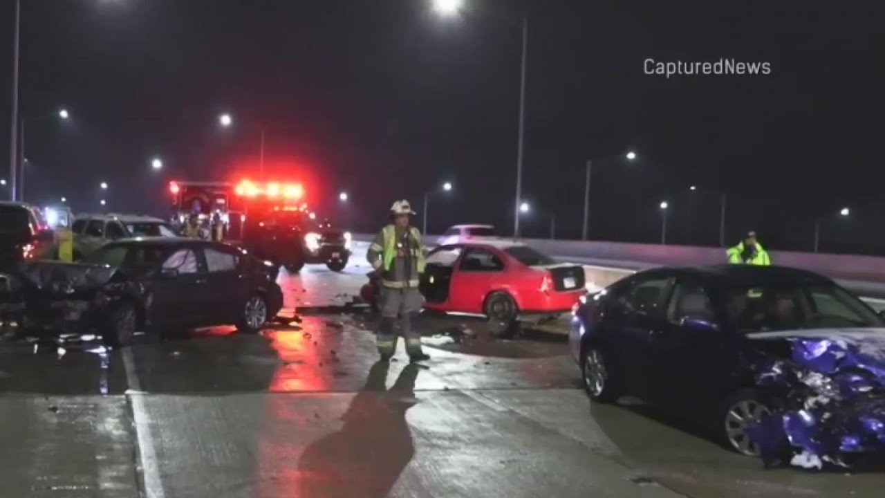 At least five cars damaged in Elgin crash over bridge