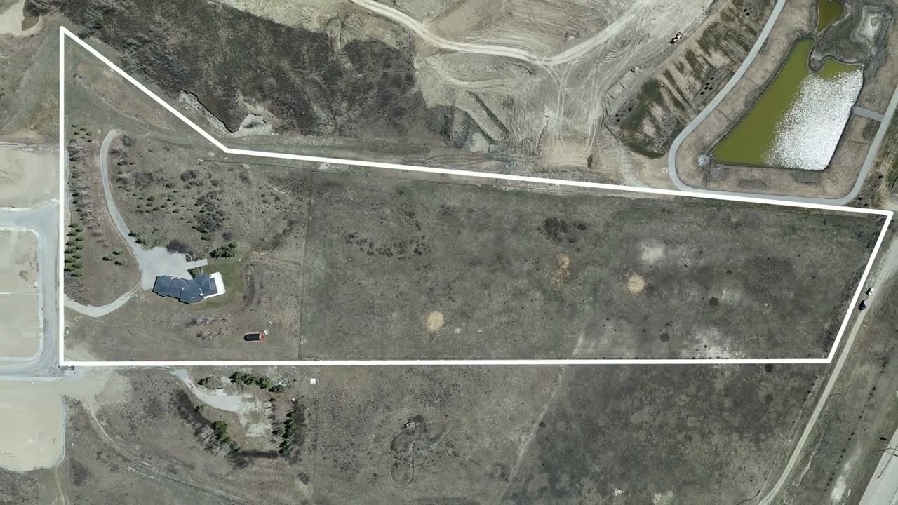 Unbuilt Potential in Heritage Hills Cochrane | New Acreage Lot, Rocky Mountain Views