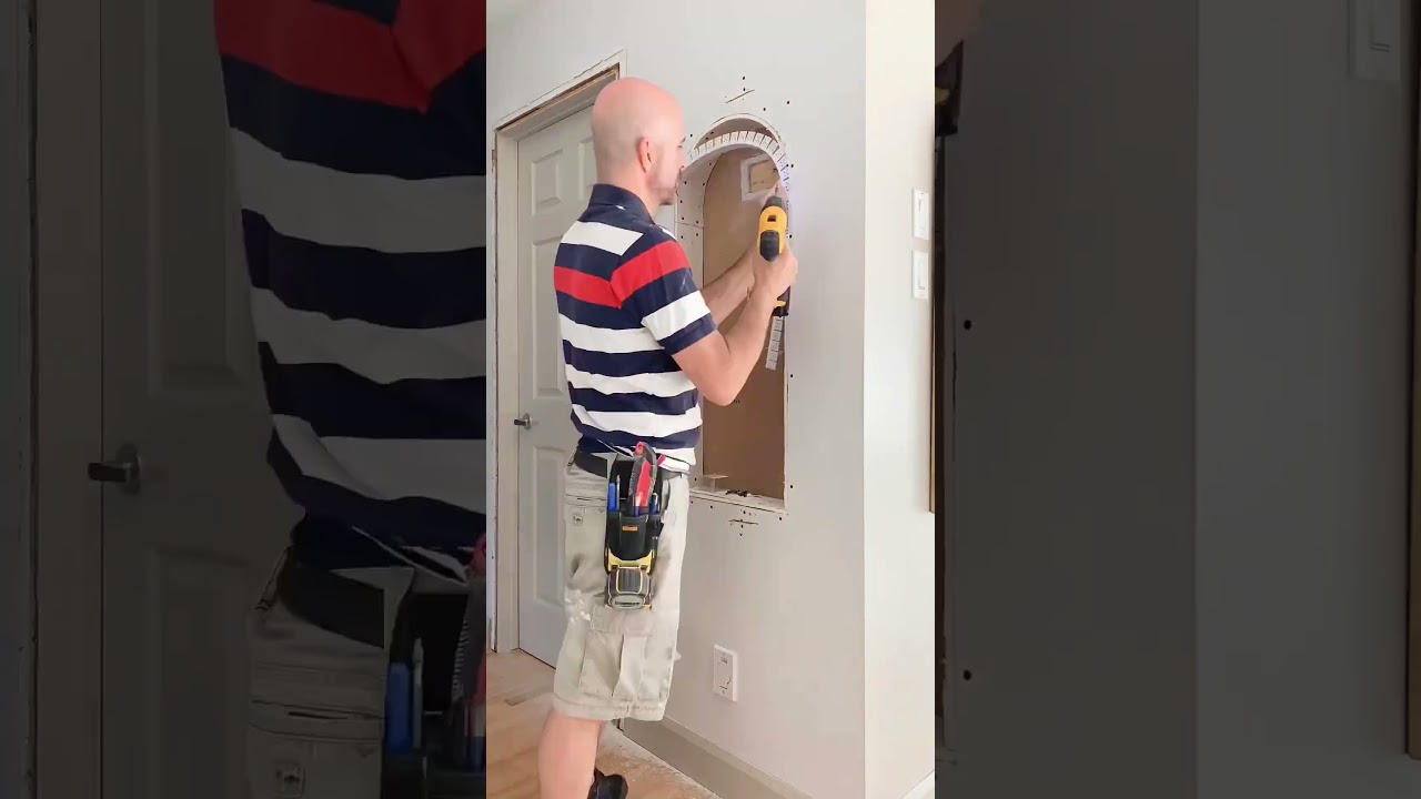 This is how we DIYed the arched wall niche in our hallway makeover #diyprojects #hallwayideas