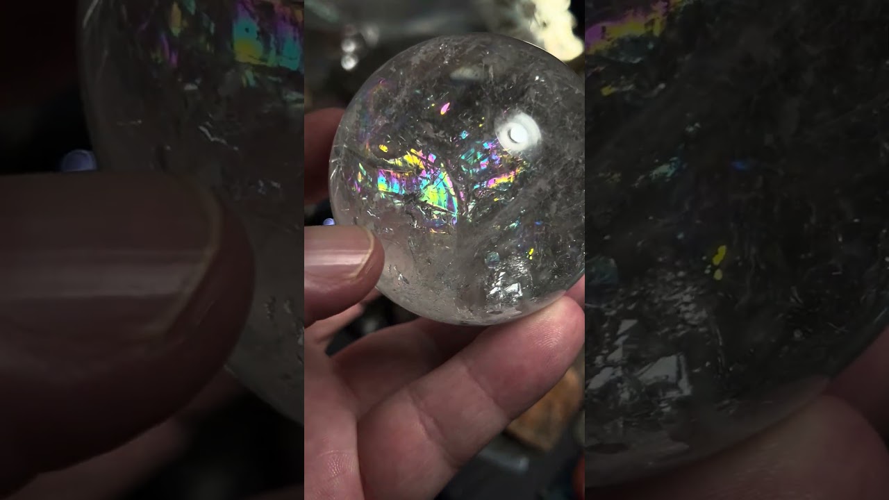 Rainbow quartz sphere with water pickers inside cut from Himalayan quartz