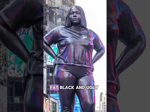 IS THE NEW STATUE IN TIME SQUARE REALLY FAT BLACK AND UGLY?
