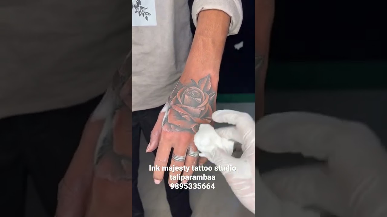 Rose tattoo on hand