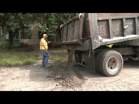 New contractor hired to speed repairs of bumpy Sherman street