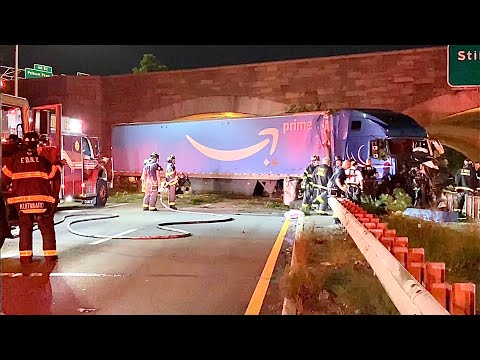 ( FDNY BOX 4456 - BRONX ) - AMAZON PRIME TRACTOR TRAILER VEERS OFF A HIGHWAY & ENDS UP ON A PARKWAY.