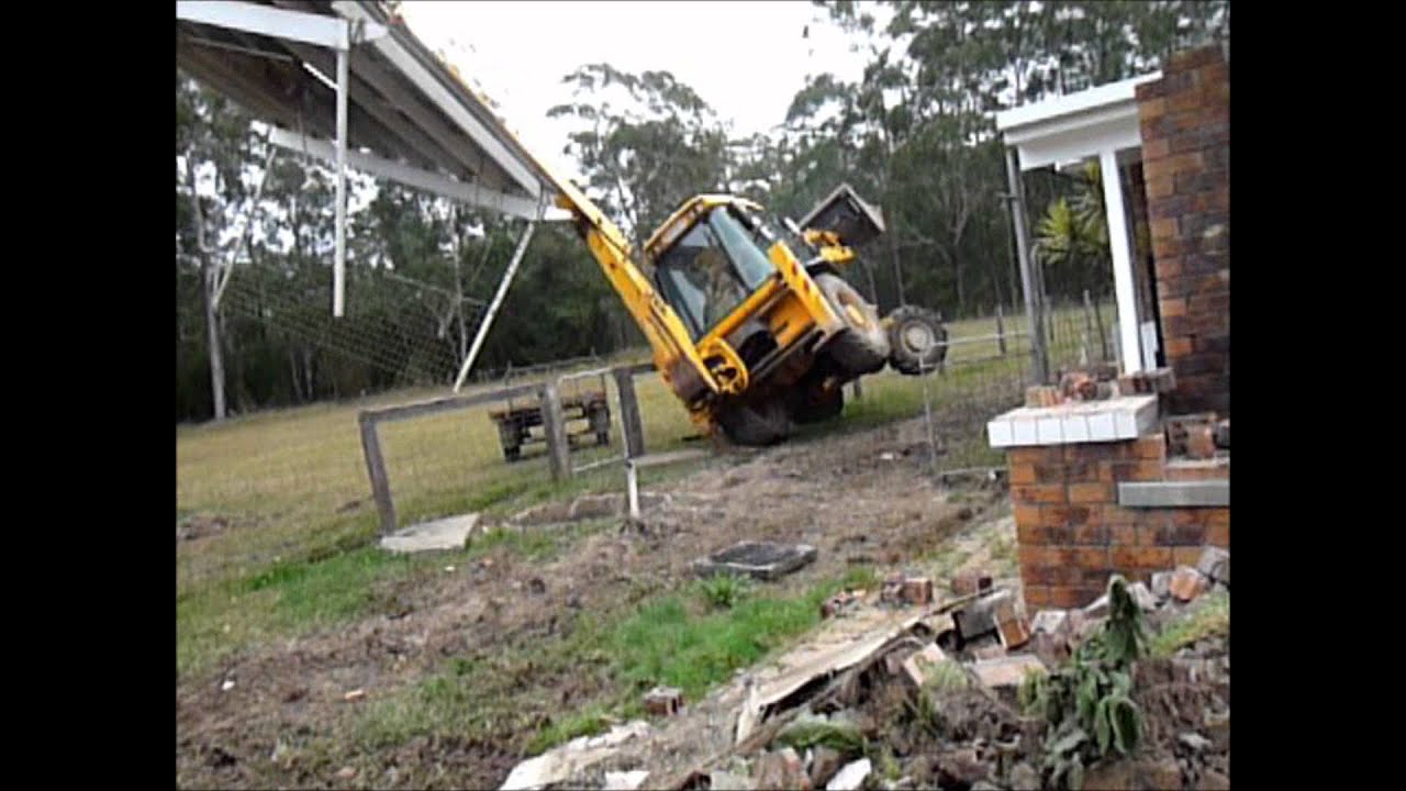 Backhoe Tips Over
