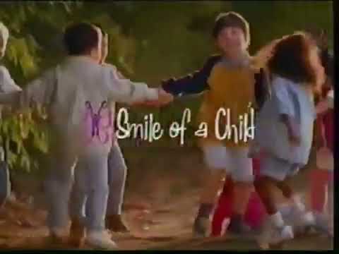 Smile of a Child Bumper ID "Children holding hands and skipping!"