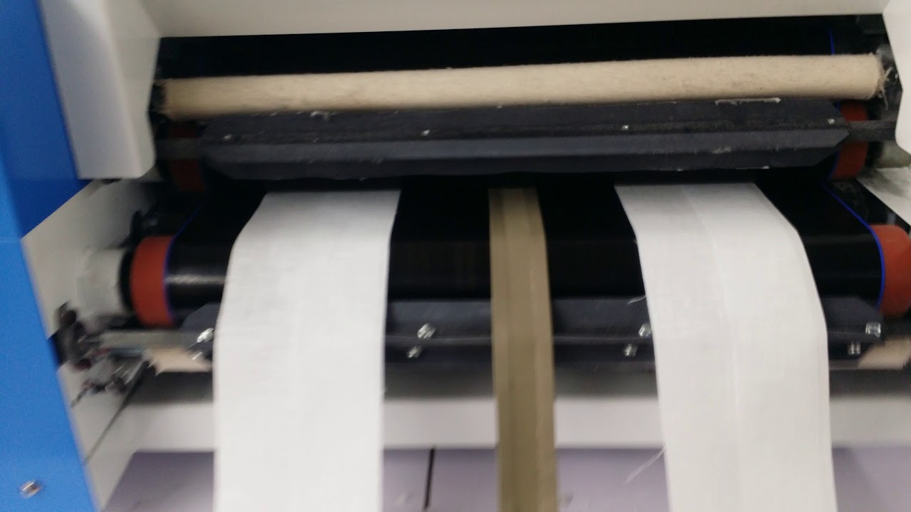 Waist belt by ironing by folder in fusing machine