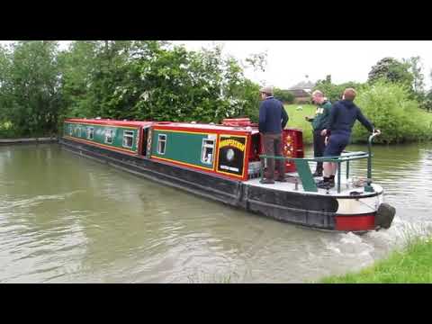 Captain Robert uses a winding hole to turn the narrowboat
