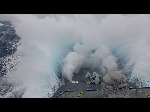 Watch this Navy Ship Take on a Truly Gigantic Wave