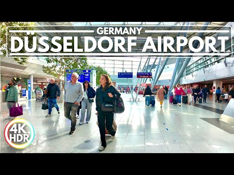 Düsseldorf International Airport DUS in Germany, October 2024 - Germans Escaping Cold Autumn 4K HDR