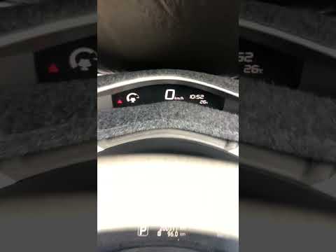 Nissan Leaf red triangle warning, upper dash display, information help solution - buckle up....