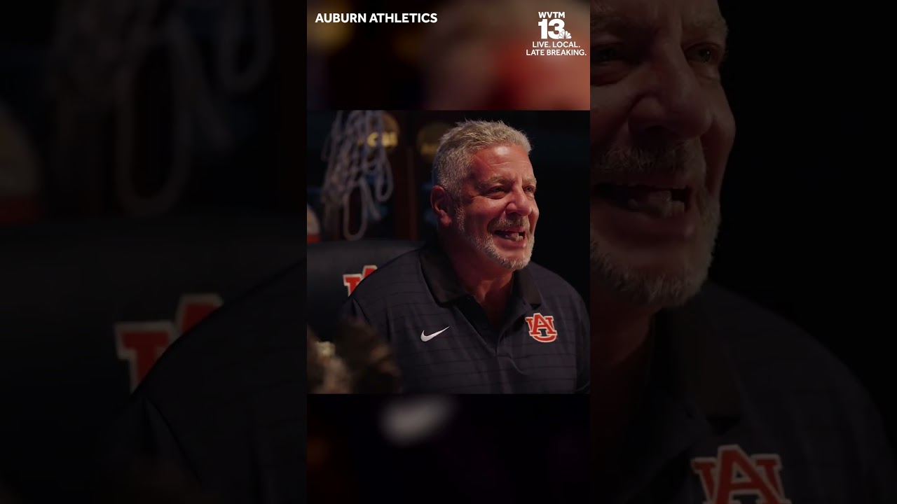 Auburn basketball coach Bruce Pearl passes the torch