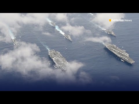 Powerfull The Nimitz-class aircraft carriers USS John C. Stennis and USS Ronald Reagan