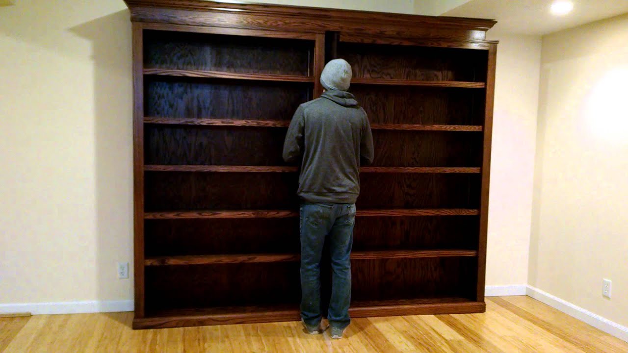 Sliding bookcase/hidden door