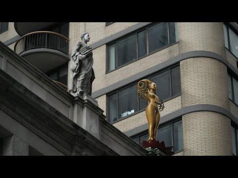 Woman statue finally takes spot beside Moses, Confucius at New York court