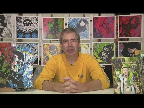Jim Calafiore, artist for DC Comic's Aquaman, gives advice at Awesome Con 2022