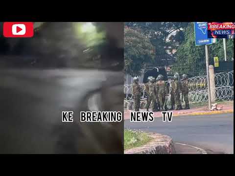 Police Officers ring fence along parliament road with a wire-mesh and block roads leading into CBD