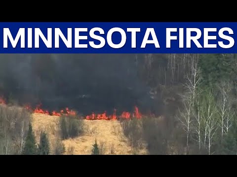 Crews fight to contain wildfires in northern MN