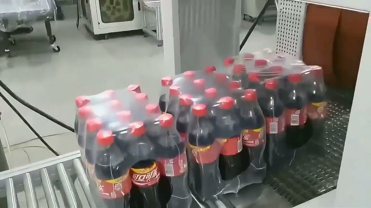 automatic shrink wrapping machine for bottles cartons boxes #shrinkwrapper #packingmachine