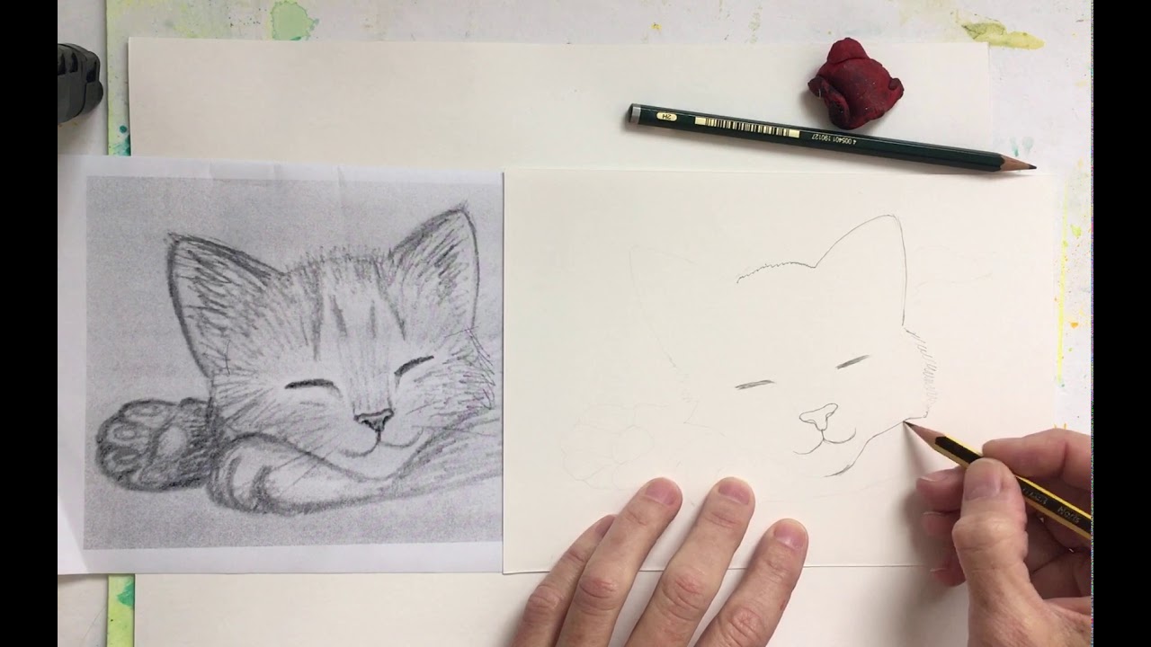 Einen einfachen kleinen Katzenkopf zeichnen.
