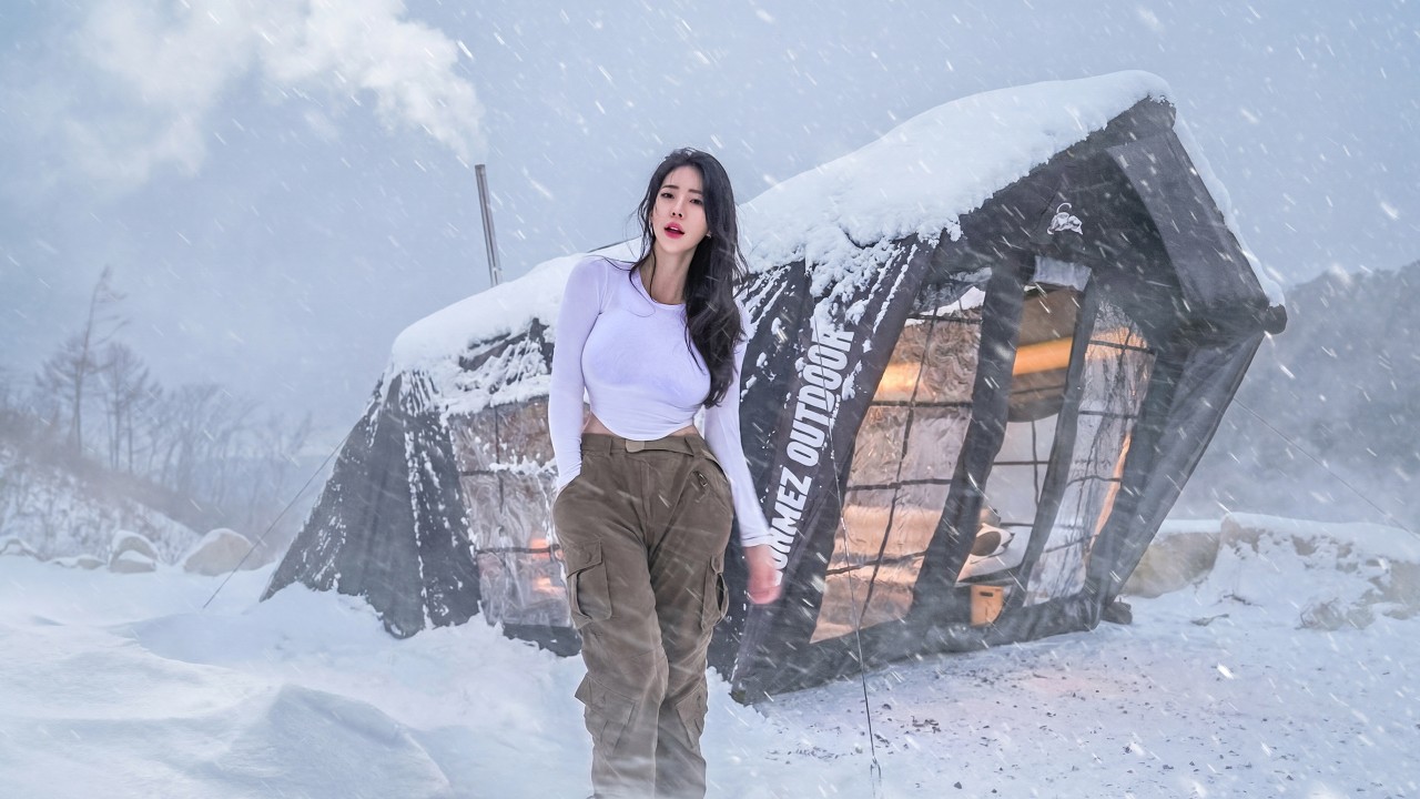 ❄️CAMPING IN A SNOWSTORM WITH A GIANT INFLATABLE TENT