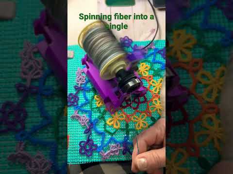 Spinning Fiber into yarn on my Nano EEL wheel by Dreaming Robots